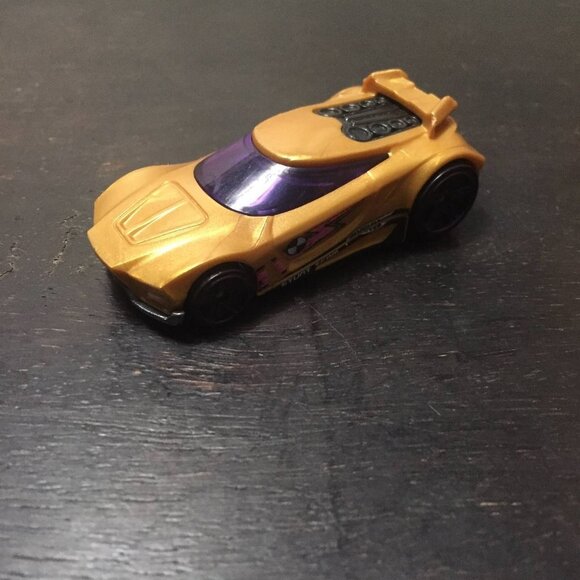 Toys | Gold Race Car Action Figure Toy | Poshmark